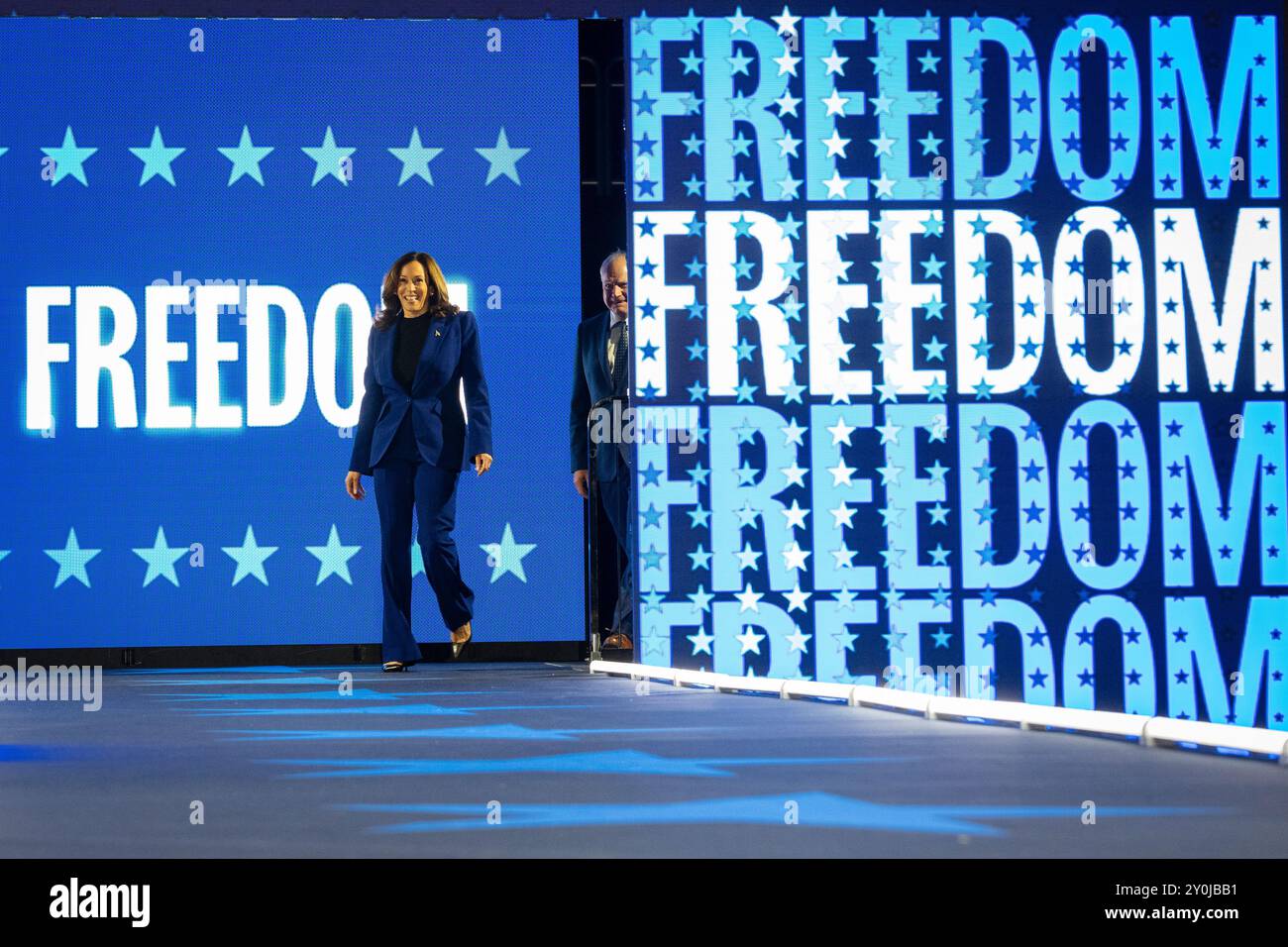 Vice President Kamala Harris, and her running mate, Tim Walz, speak at ...