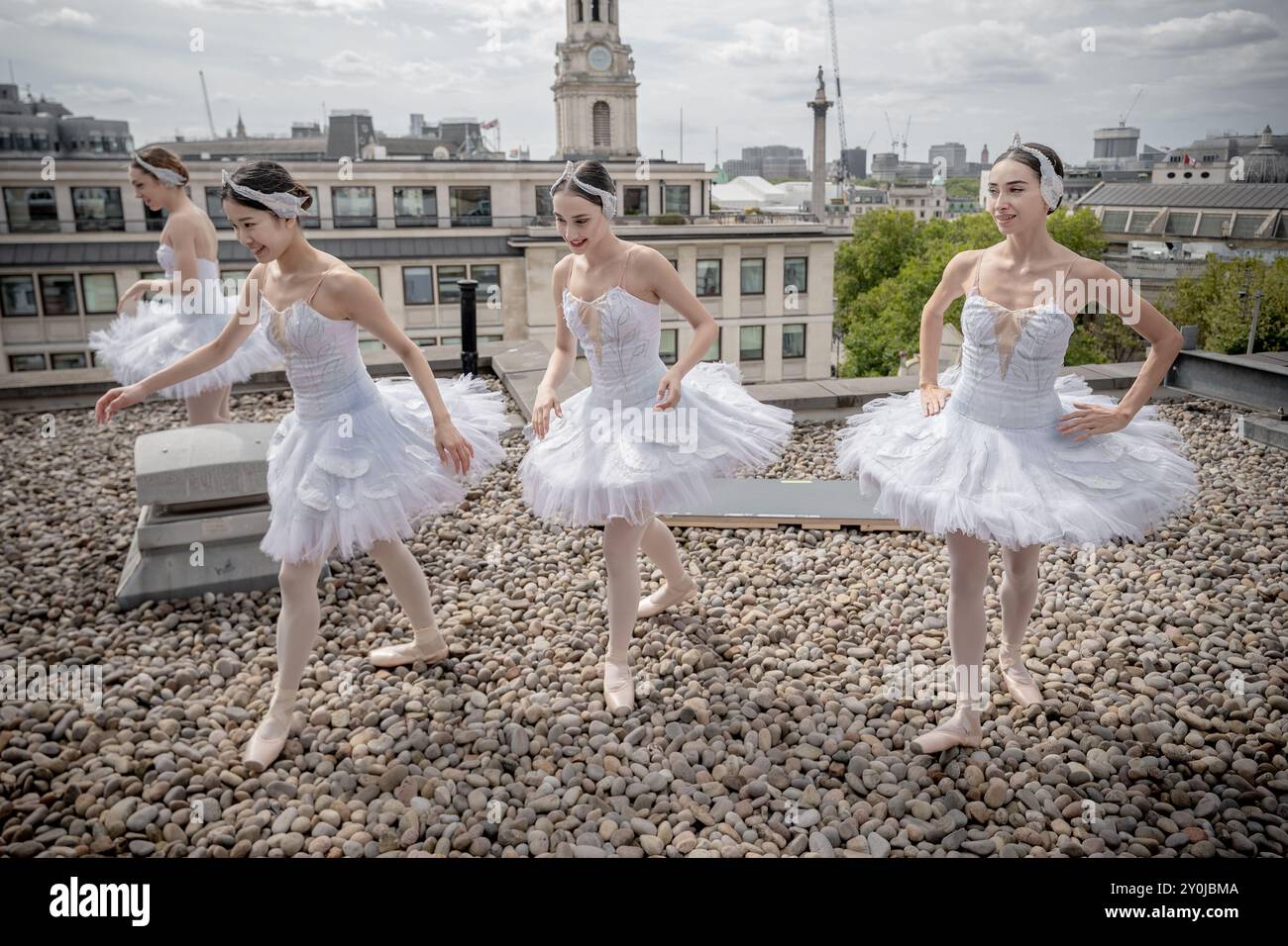 Cygnets from the state Ballet of Georgia pose for photos ahead of their ...