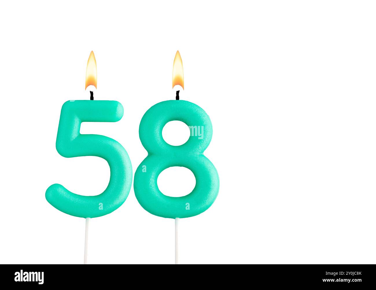 Birthday number 58 - Green birthday candle on white background Stock ...