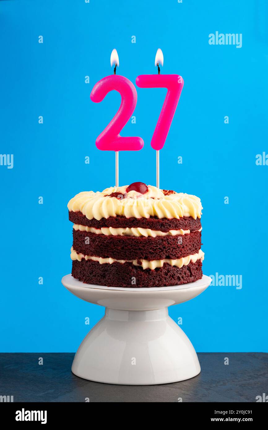 Birthday number 27 - Candle with red velvet cake Stock Photo - Alamy