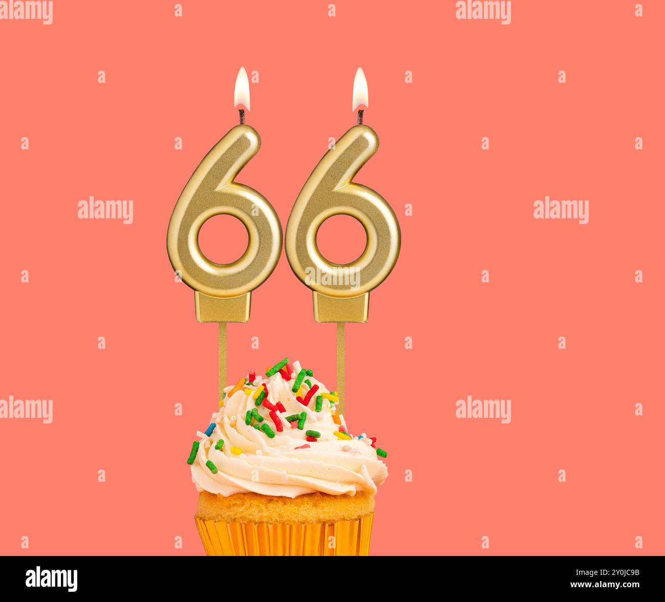 Birthday candle and cupcake - Number 66 Stock Photo - Alamy