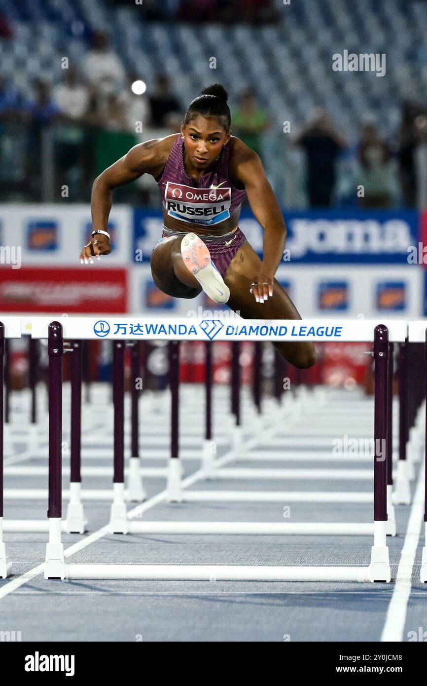 Masai Russell of United States of America competes in the women's 100m ...