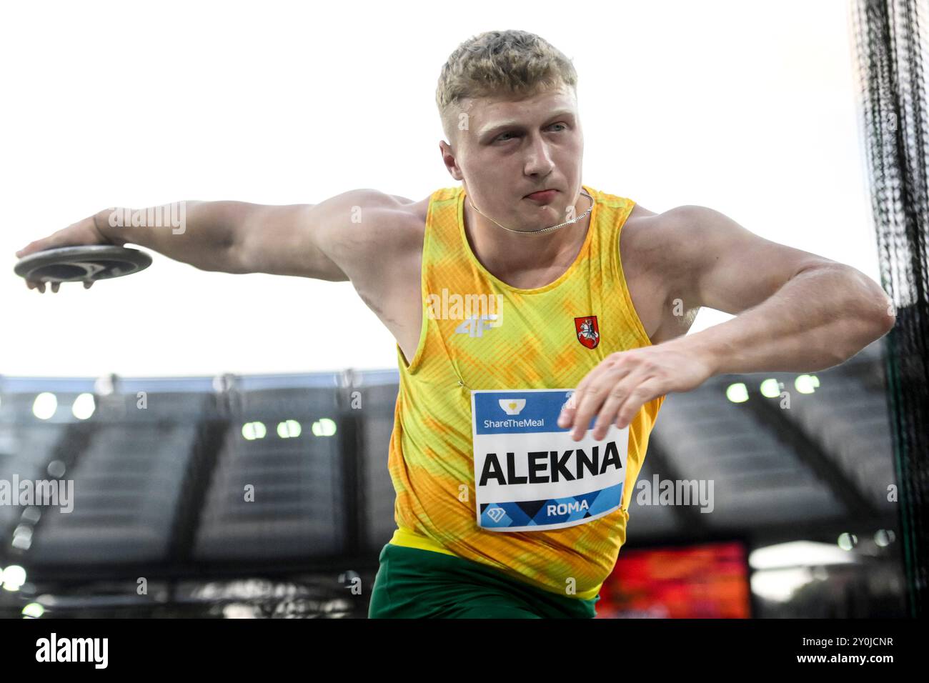 Mykolas Alekna of Lithuania competes in the men's discus throw final ...