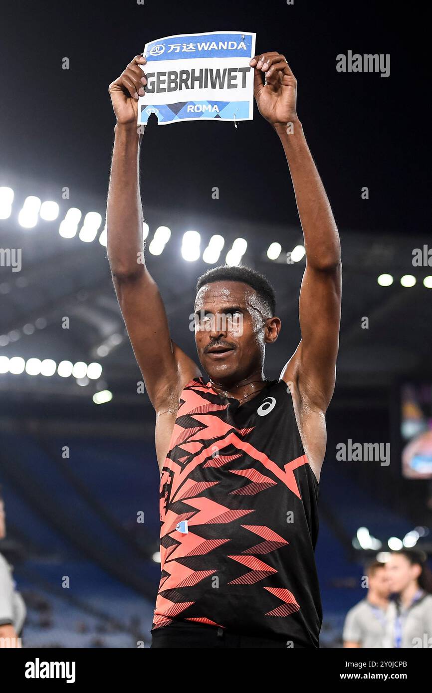 Hagos Gebrhiwet of Ethiopia celebrates after winning the men's 5000m ...
