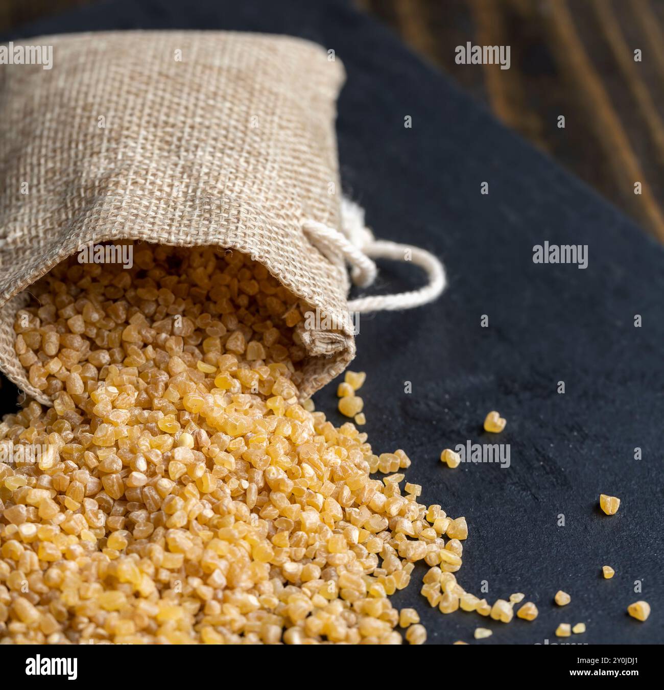 Not cooked wheat porridge in a linen bag , fresh crushed wheat groats ...