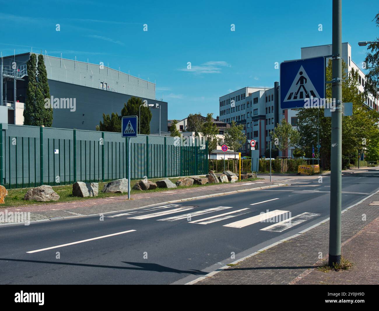 A zebra crossing in Germany in an industrial area Stock Photo - Alamy