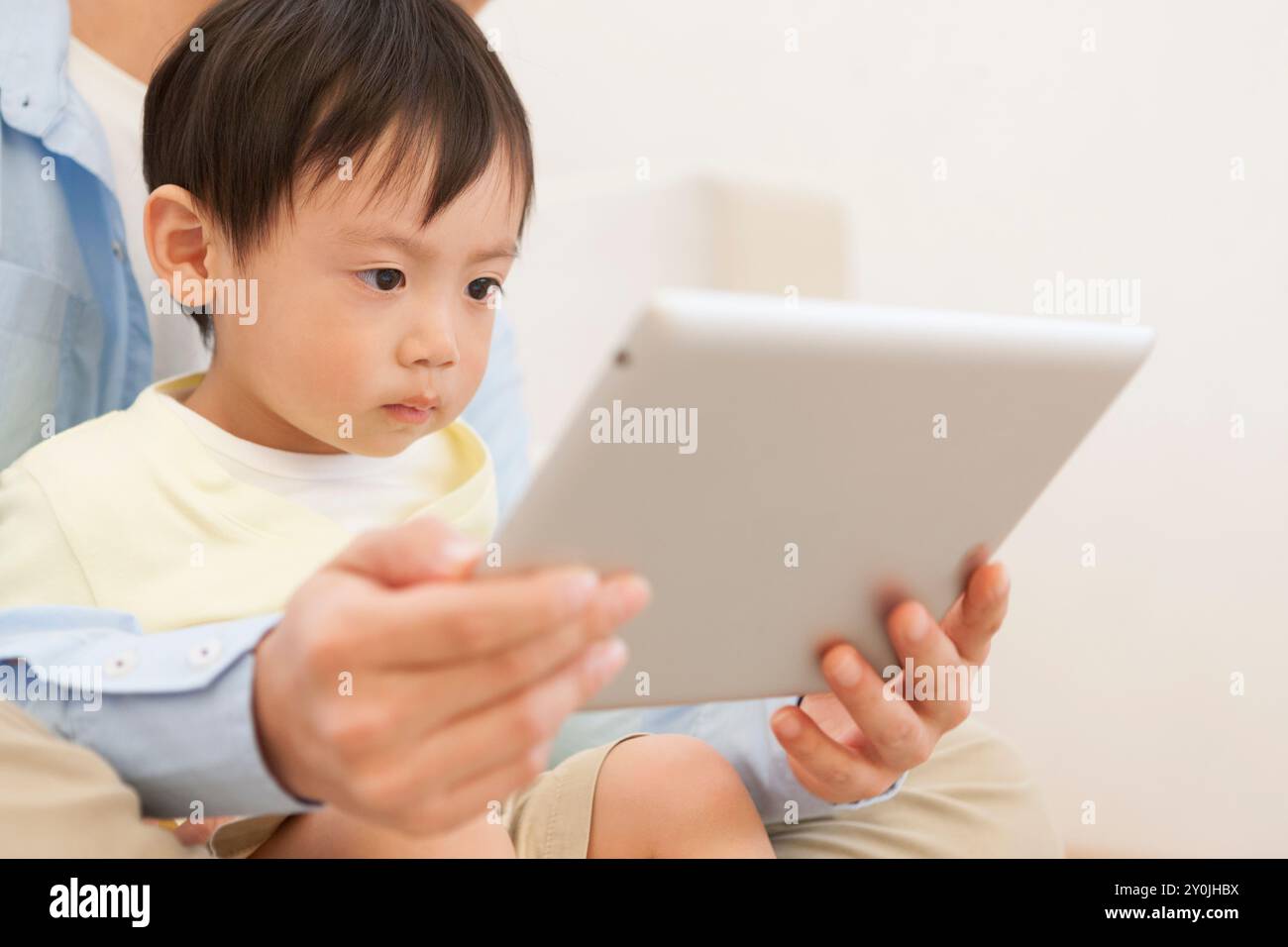 Father showing son picture hi-res stock photography and images - Alamy
