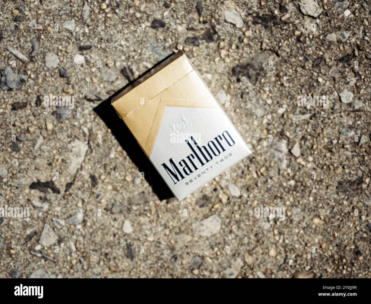 Marlboro Light cigarette box in the pavement Stock Photo - Alamy