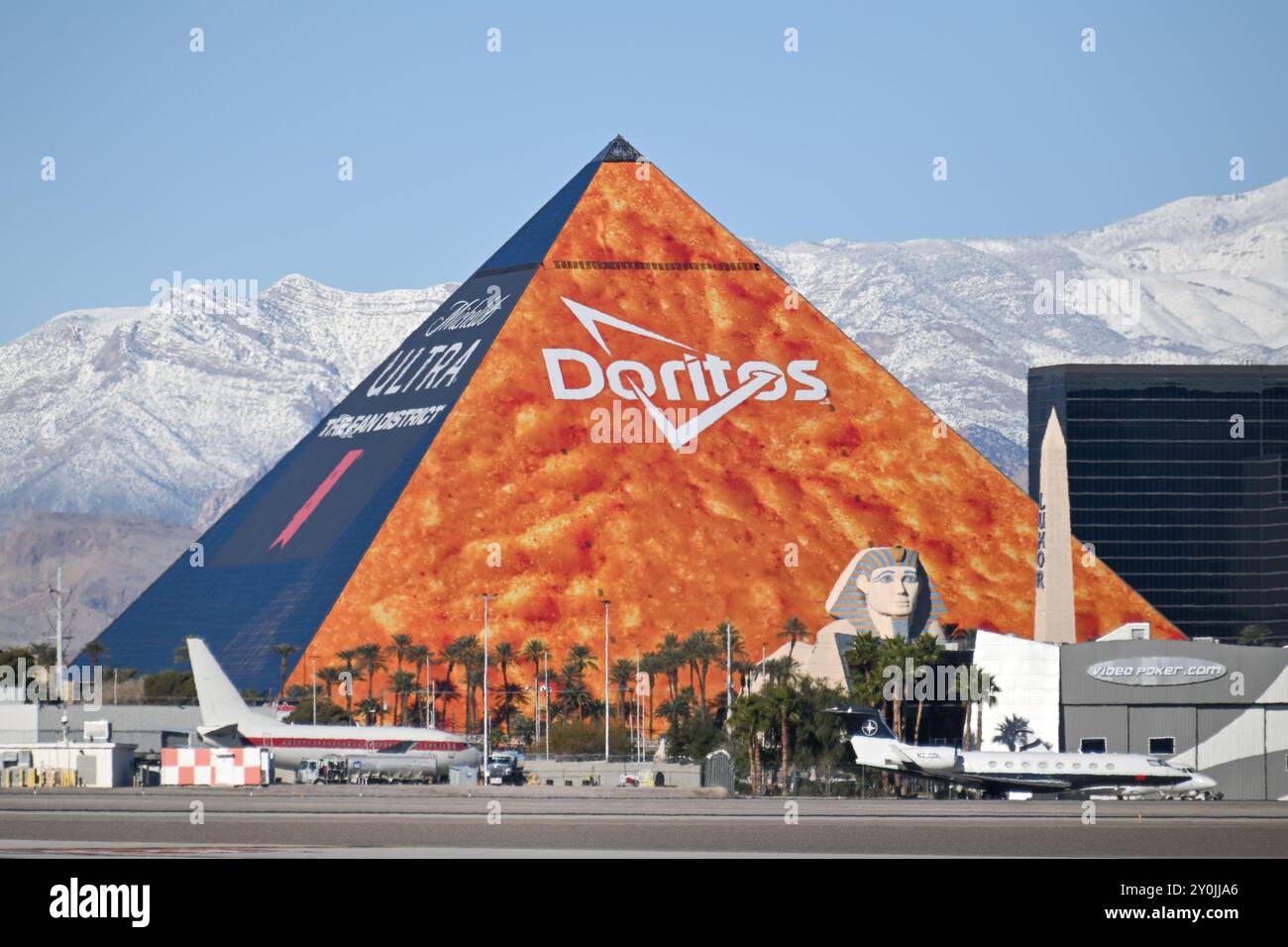 The Luxor hotel is decorated with a Doritos advertisement prior to ...