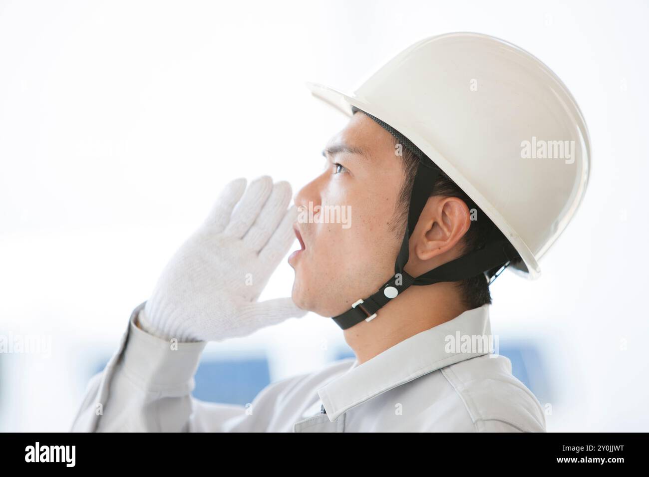 Male workers giving instructions Stock Photo - Alamy