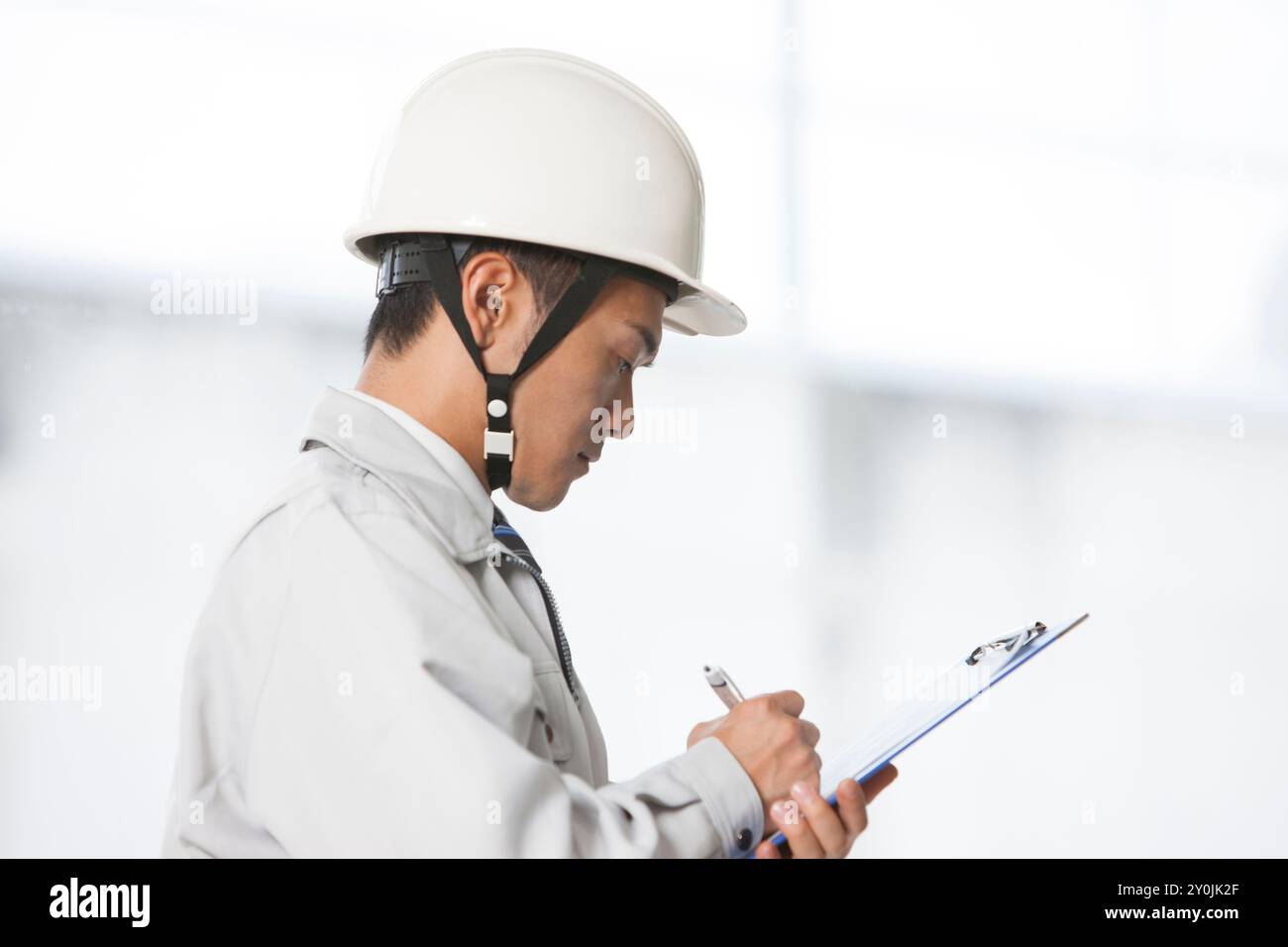 Site foreman checking the construction site Stock Photo - Alamy