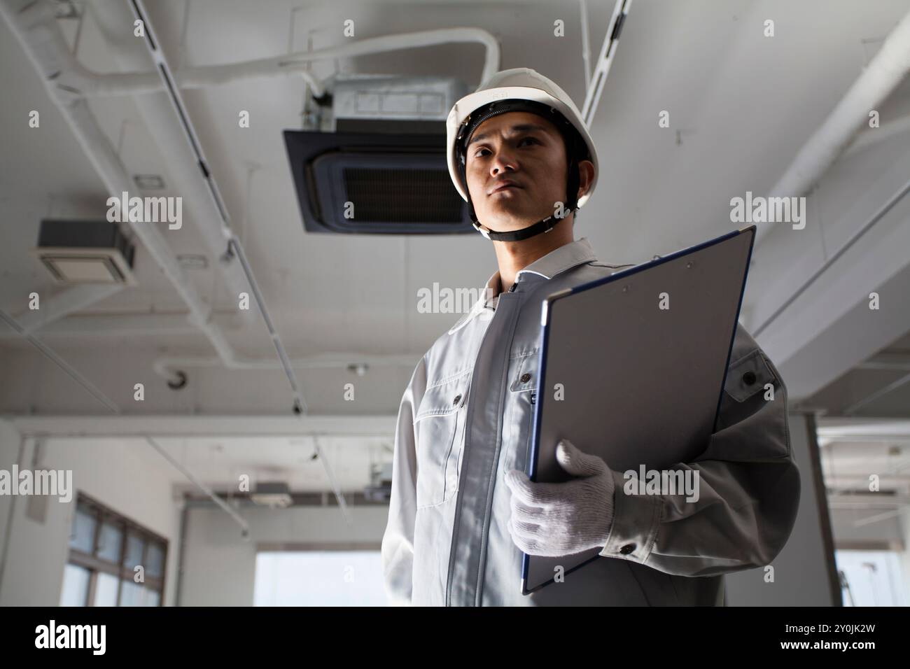 Checking indoors hi-res stock photography and images - Alamy