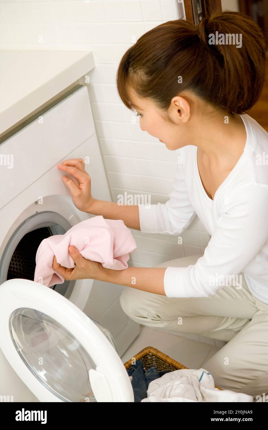 People do laundry hi-res stock photography and images - Alamy