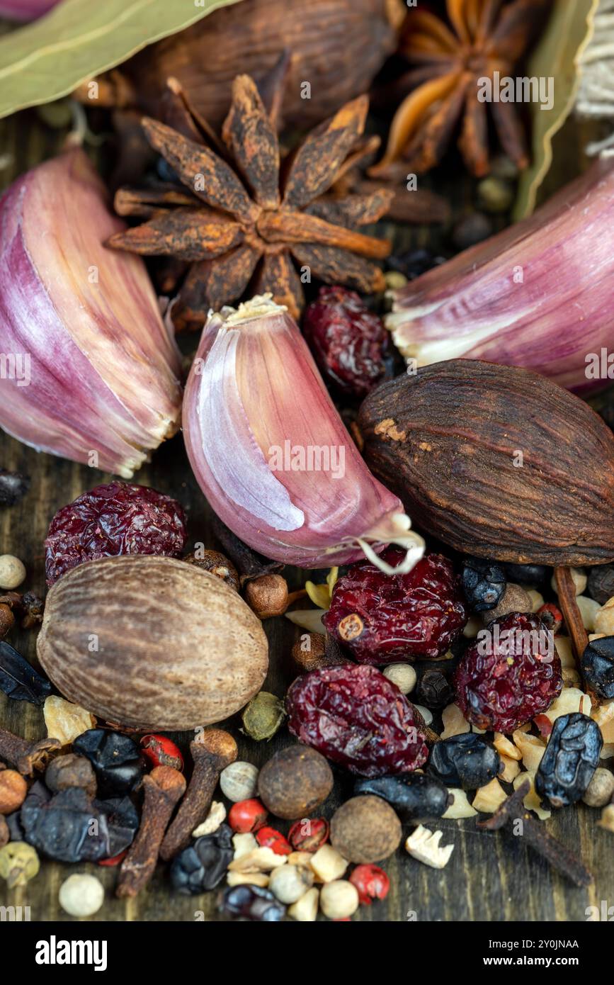 garlic cloves and mixed pleasant and fragrant spices of different types ...