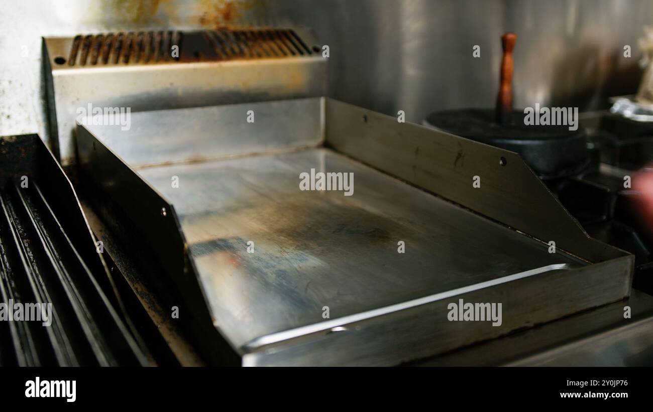 steel plate for cooking burgers Stock Photo - Alamy