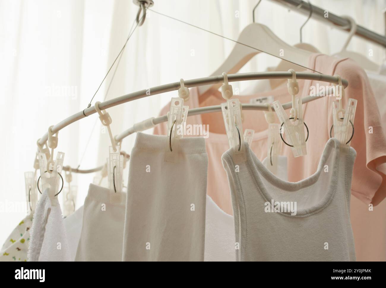Indoor drying laundry Stock Photo - Alamy