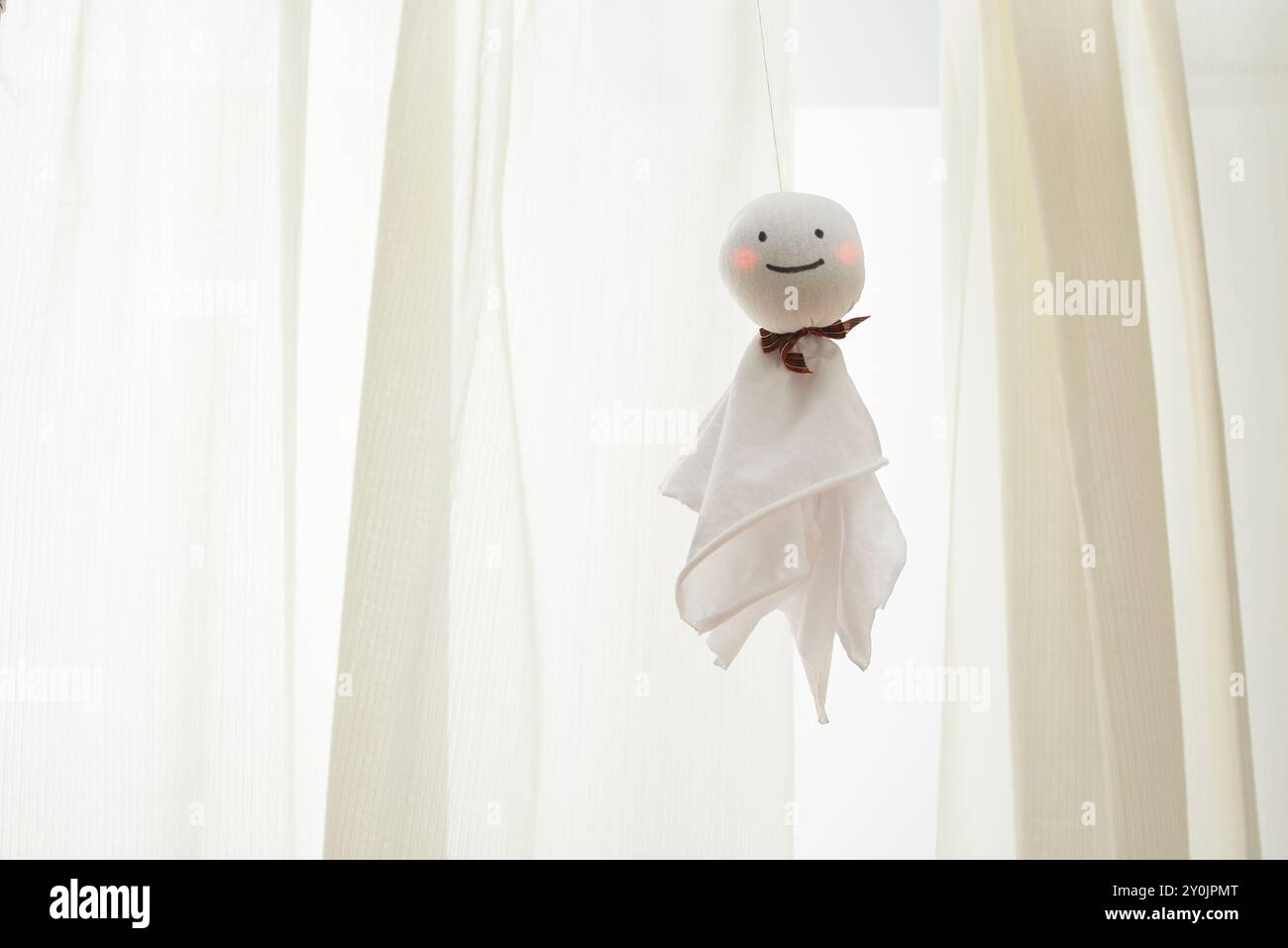 Indoor drying and a paper doll Stock Photo - Alamy