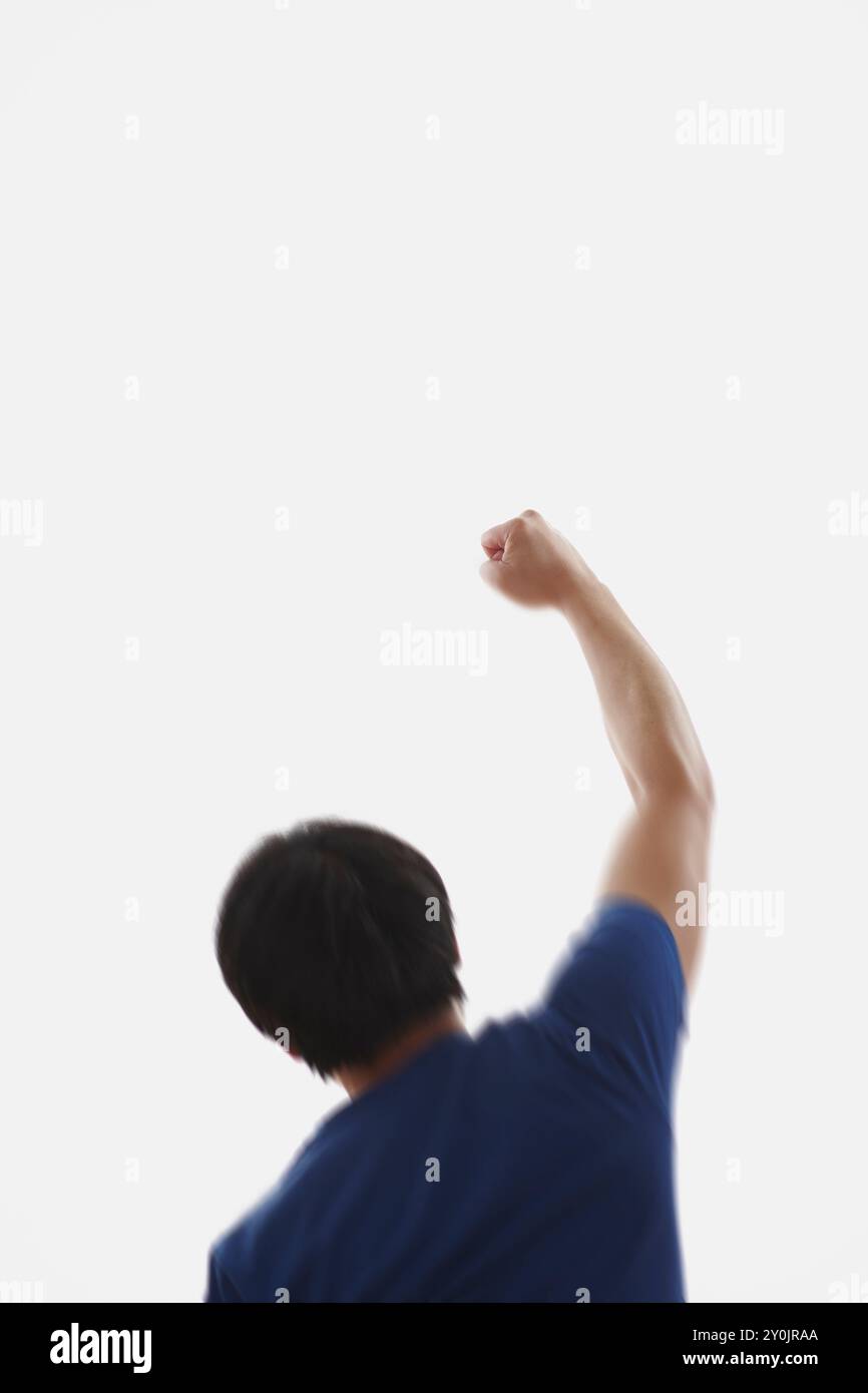 The back view of a man cheering for Japan Stock Photo - Alamy