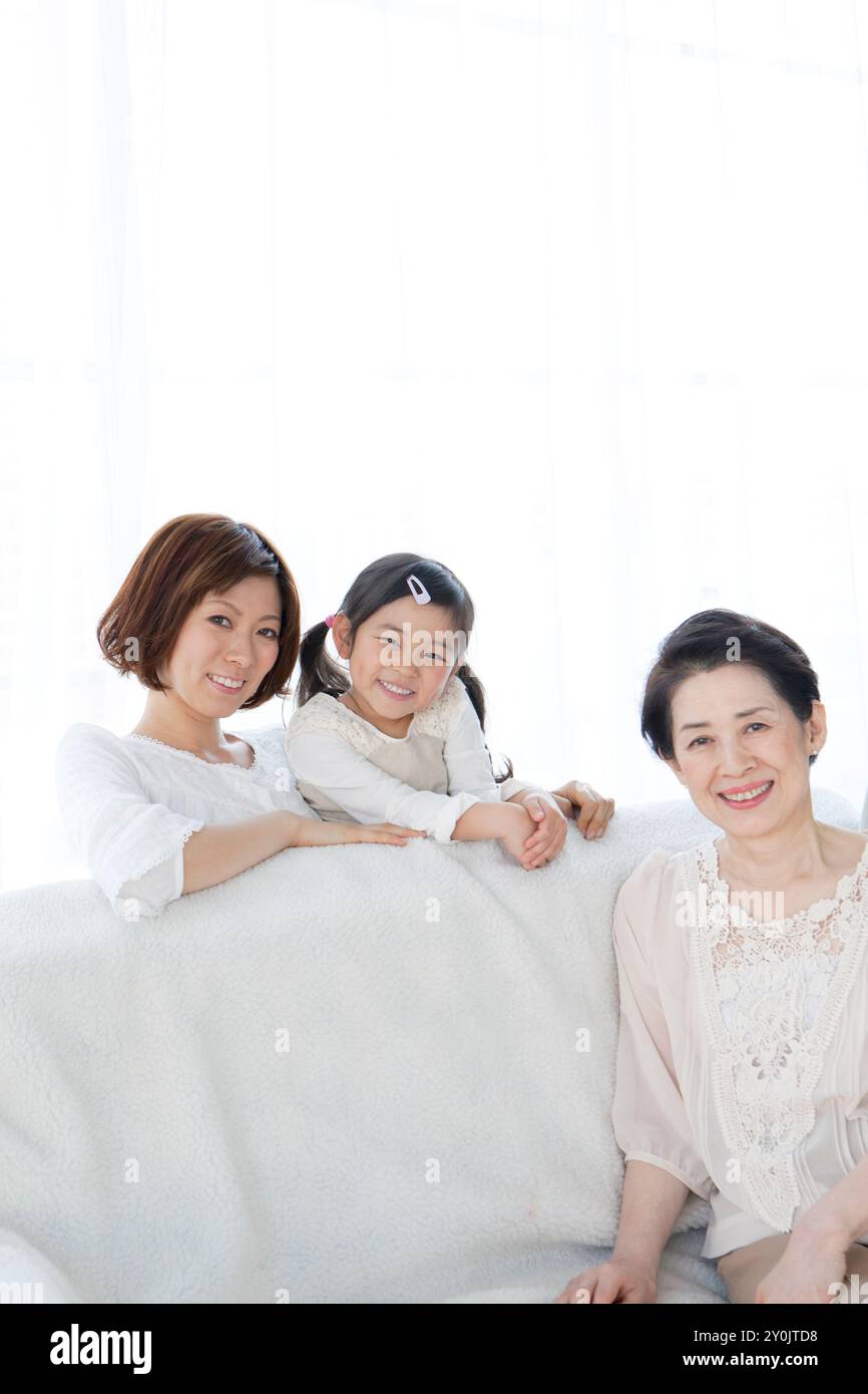 Smiling 3 generation family Stock Photo - Alamy