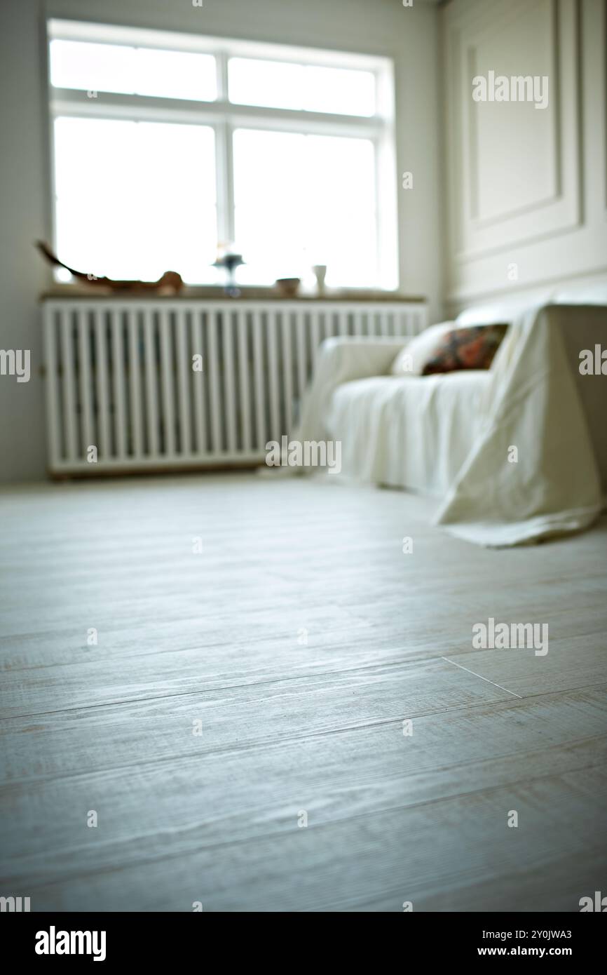 Objects placed at the window and sofa Stock Photo - Alamy