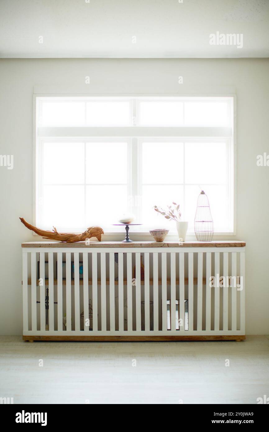 Objects placed at the window Stock Photo - Alamy