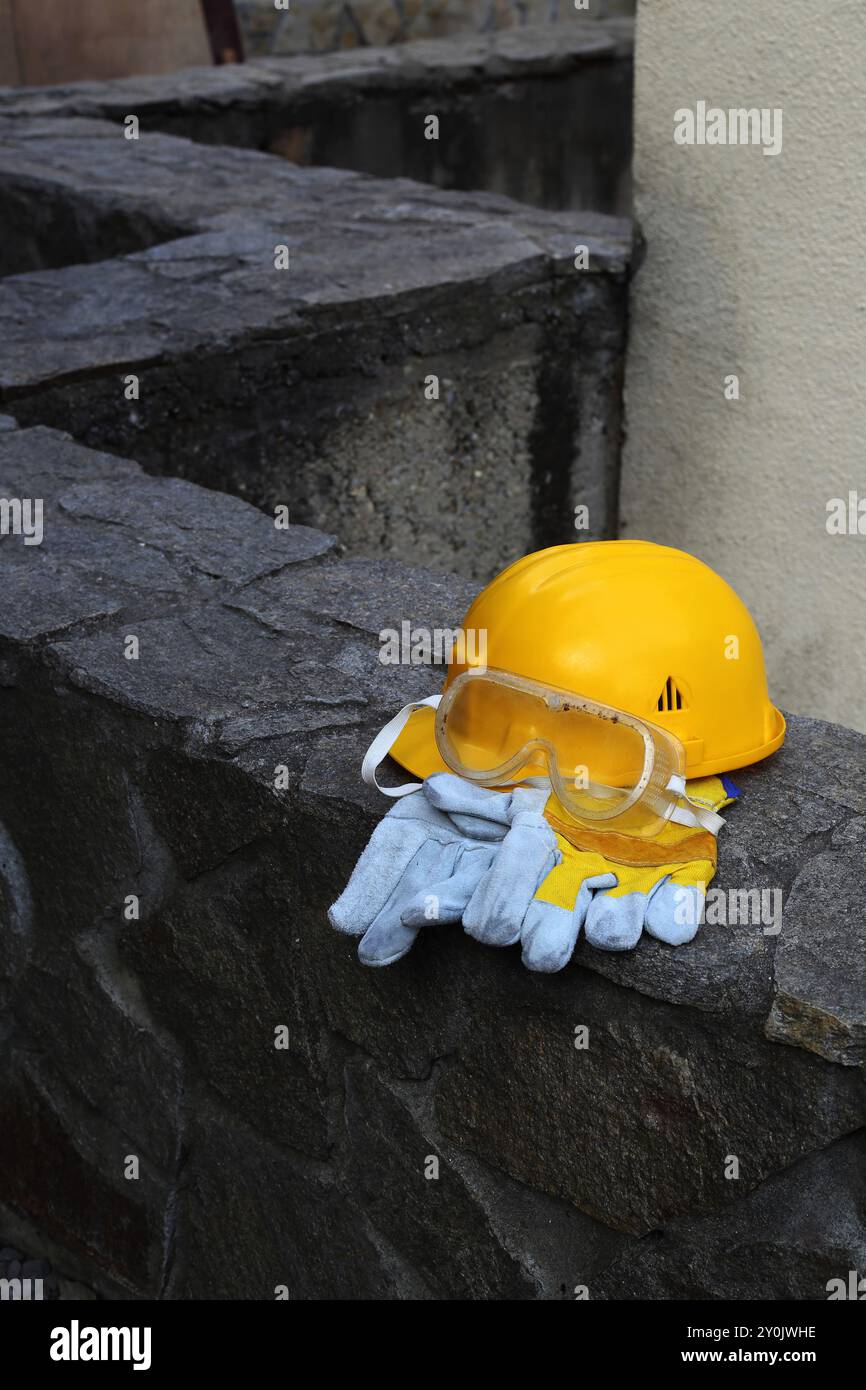 Safety first gloves goggles hi-res stock photography and images - Alamy