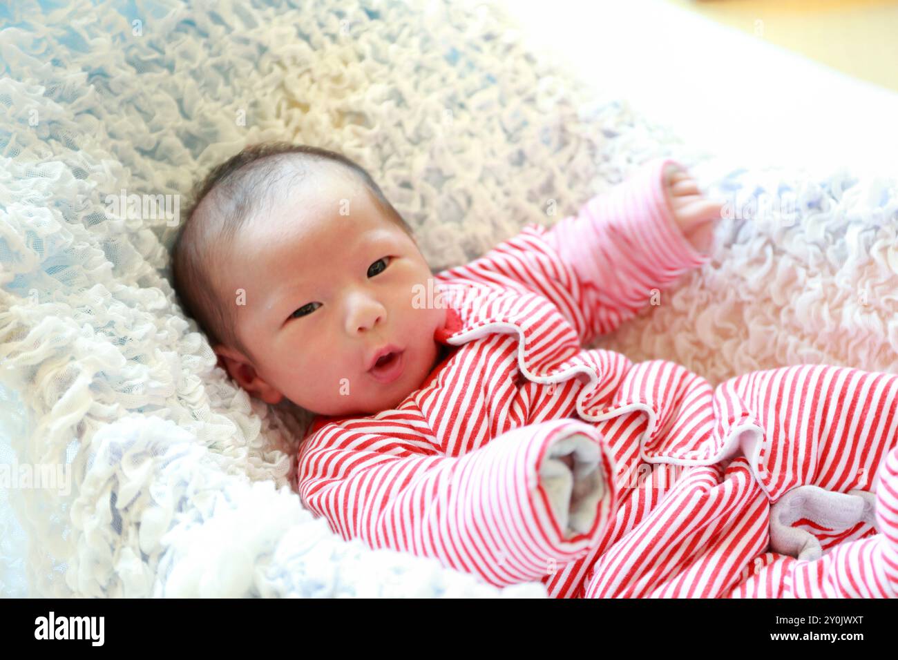 Smiling baby of three weeks after birth Stock Photo - Alamy