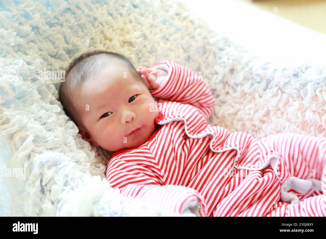 Smiling baby of three weeks after birth Stock Photo - Alamy