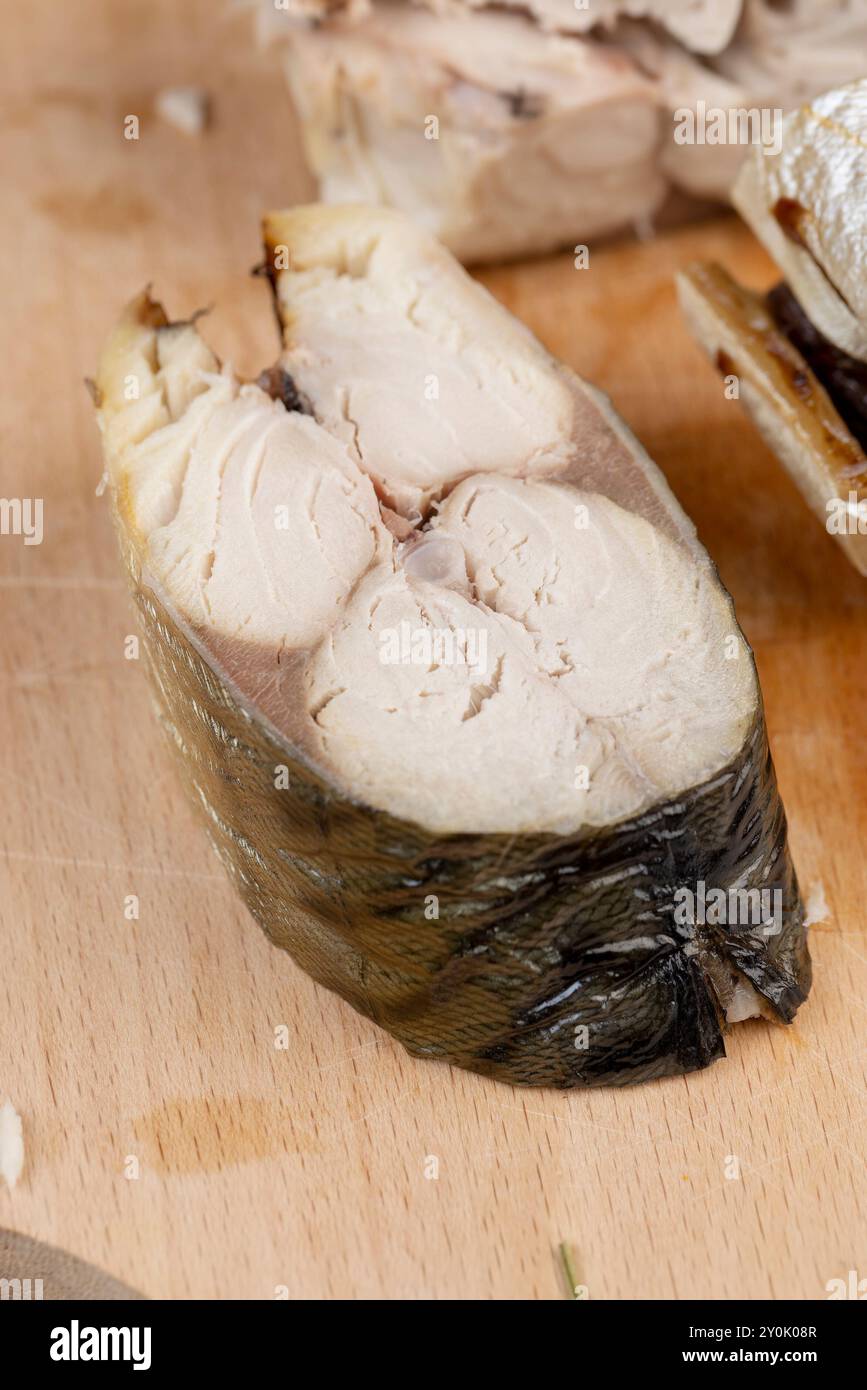 Smoked Atlantic mackerel cut into pieces, delicious meat of mackerel ...