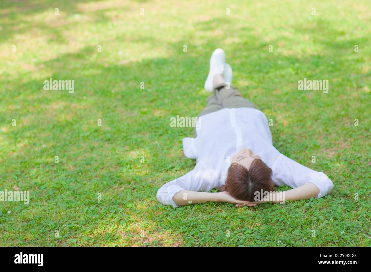Woman sleeping back view hi-res stock photography and images - Alamy