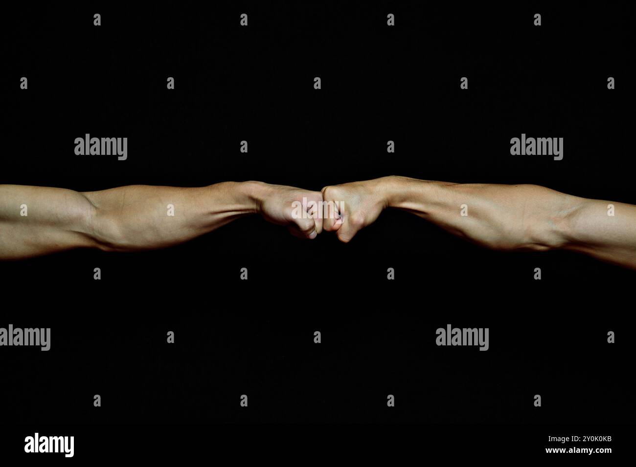 Two fists together hi-res stock photography and images - Alamy