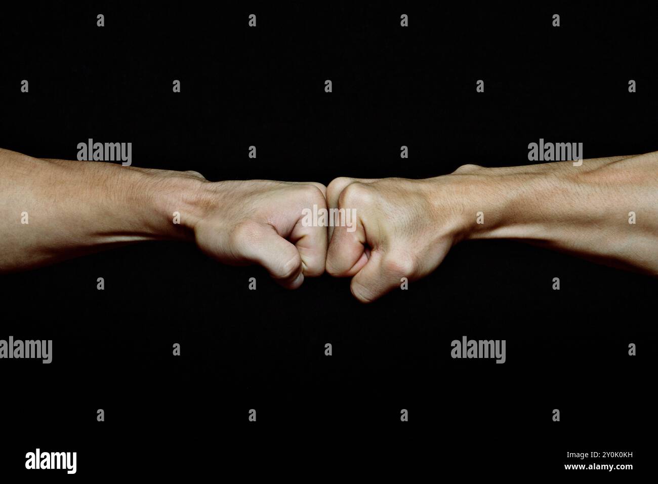 Two fists together hi-res stock photography and images - Alamy