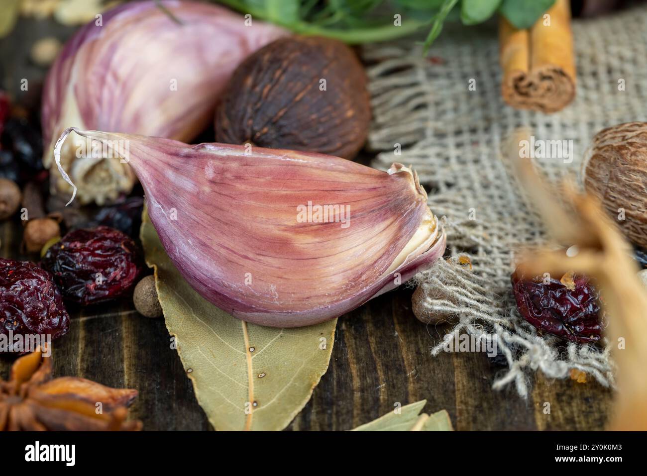 garlic cloves and mixed pleasant and fragrant spices of different types ...