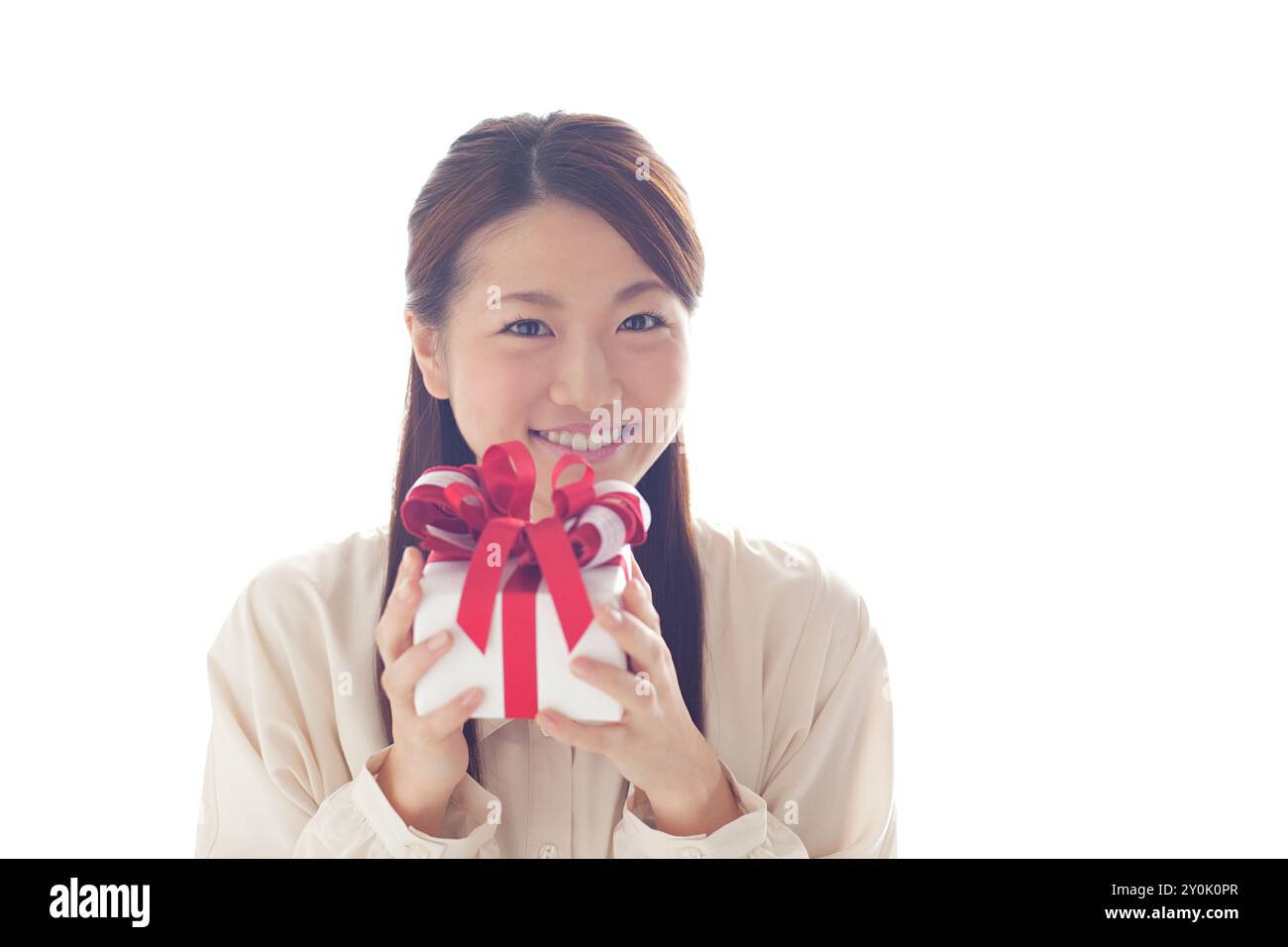 Smiling woman holds gift hi-res stock photography and images - Alamy