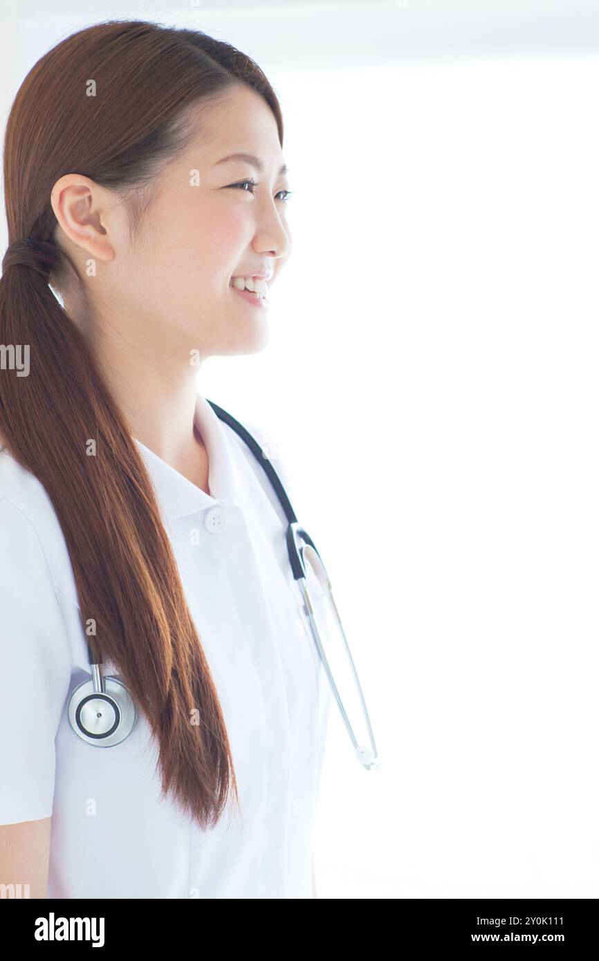 Profile of smiling nurse Stock Photo - Alamy