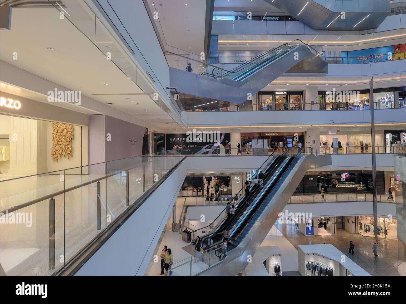 Shenzhen, China - September 02, 2024 : A modern shopping mall with a complex design, multiple ...