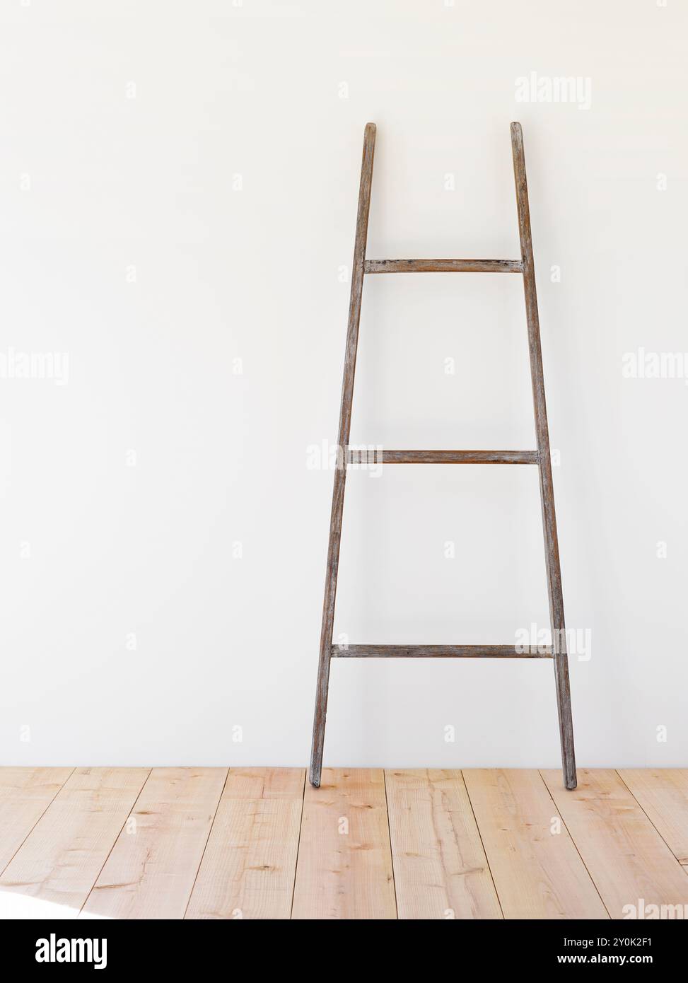Ladder placed in a room Stock Photo - Alamy