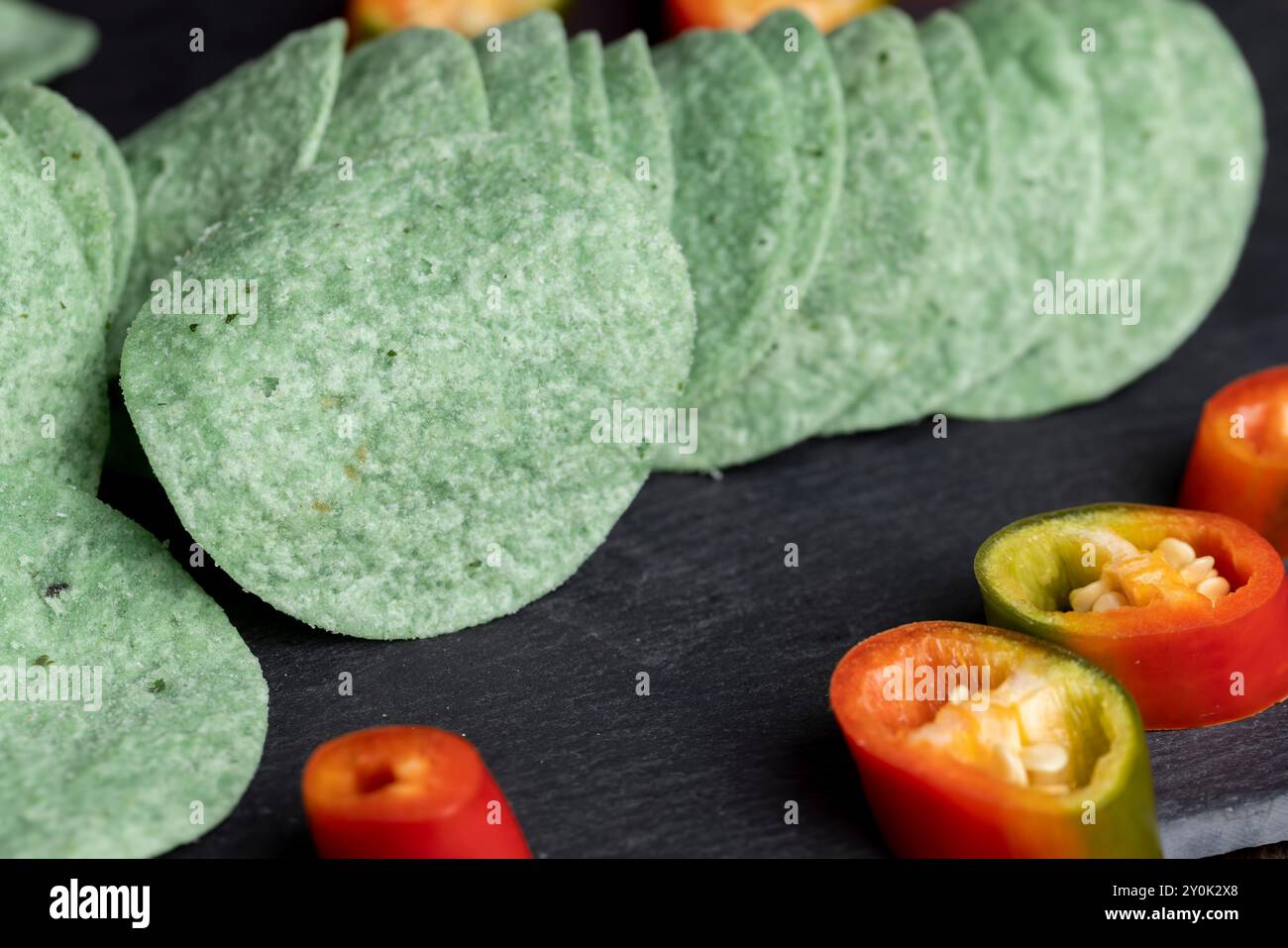 Thin and delicious green potato chips, crispy green chips with pepper ...
