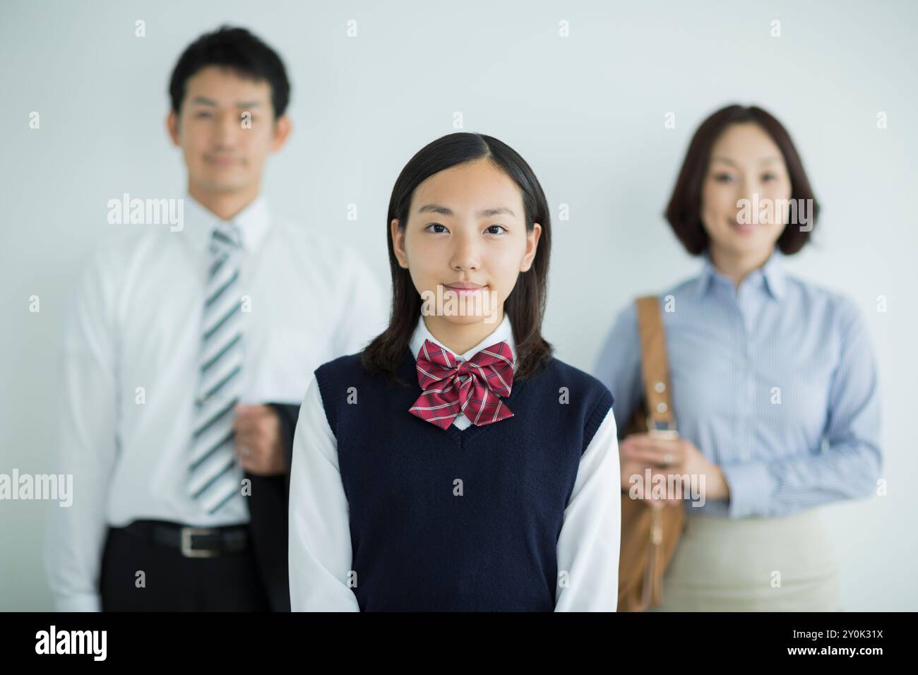 Parents and daughter in high school Stock Photo - Alamy