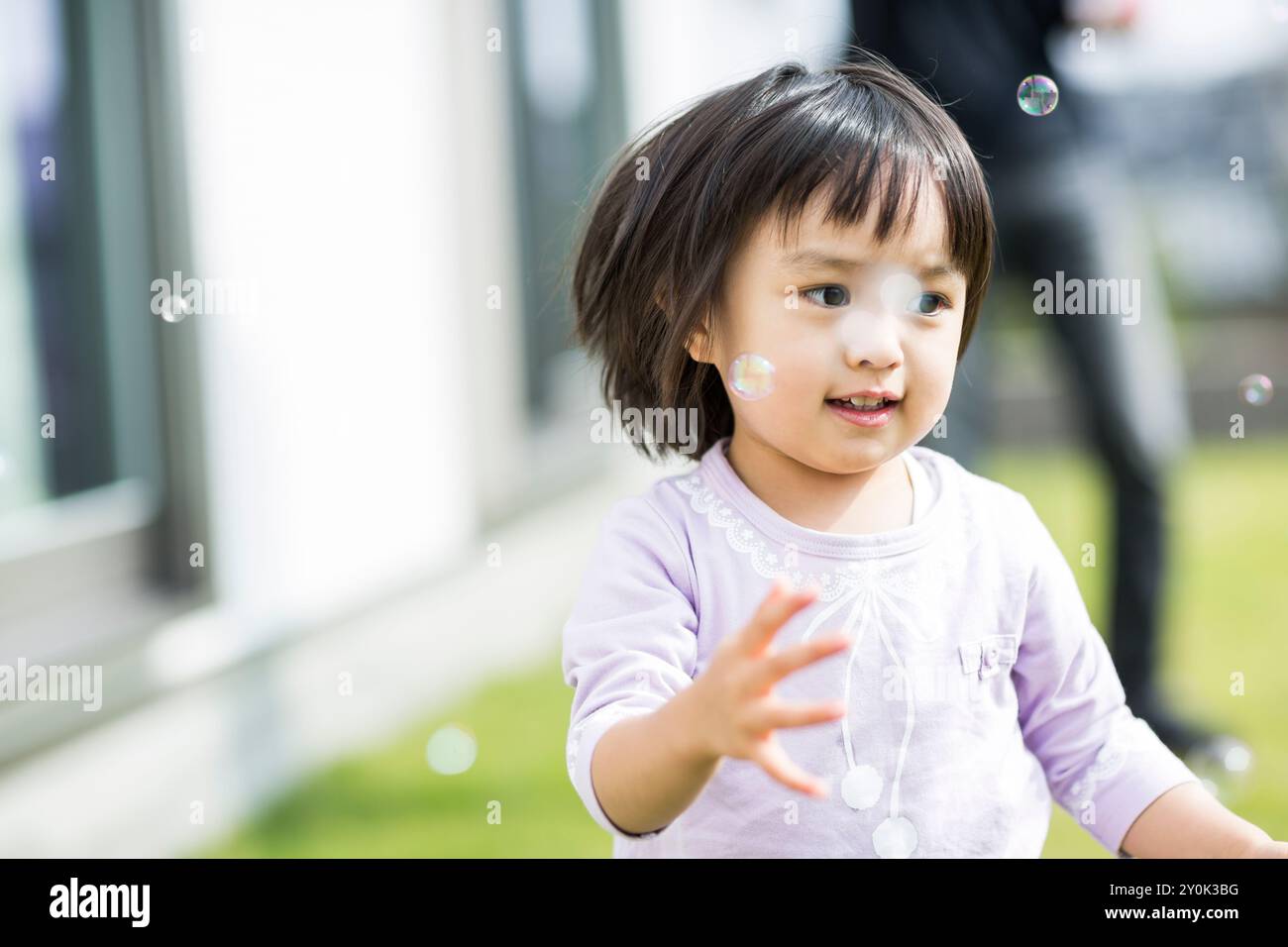 Child chasing child hi-res stock photography and images - Alamy