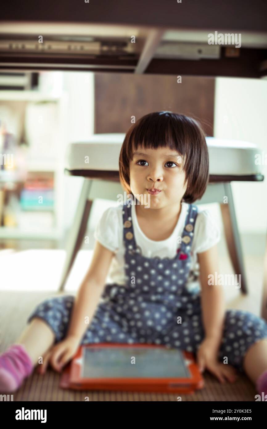 Girl with Tablet Stock Photo - Alamy