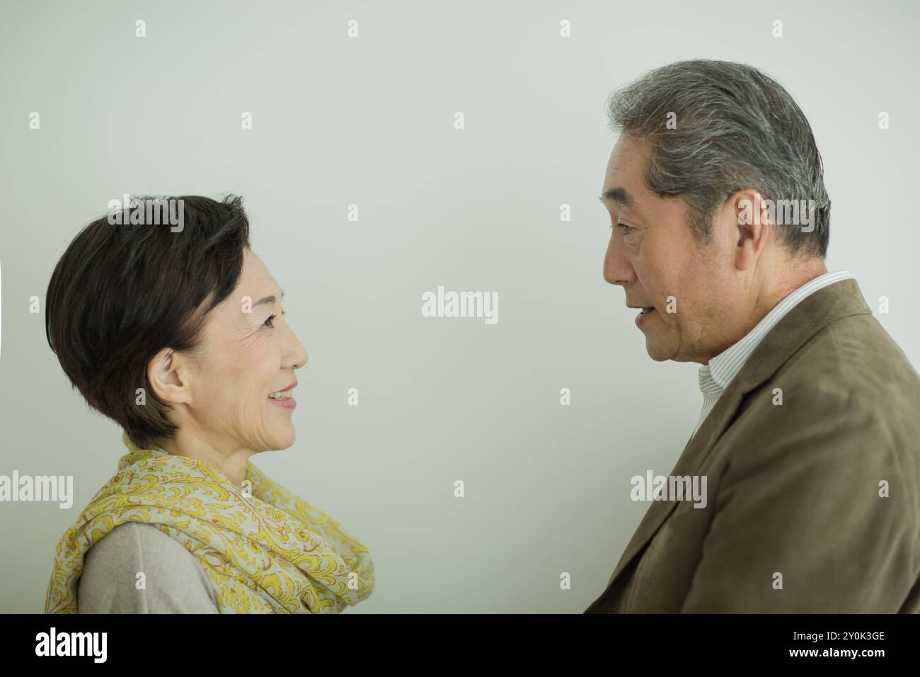 Two people facing hi-res stock photography and images - Alamy