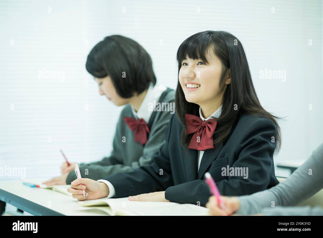 High school girls studying in a cram school Stock Photo - Alamy