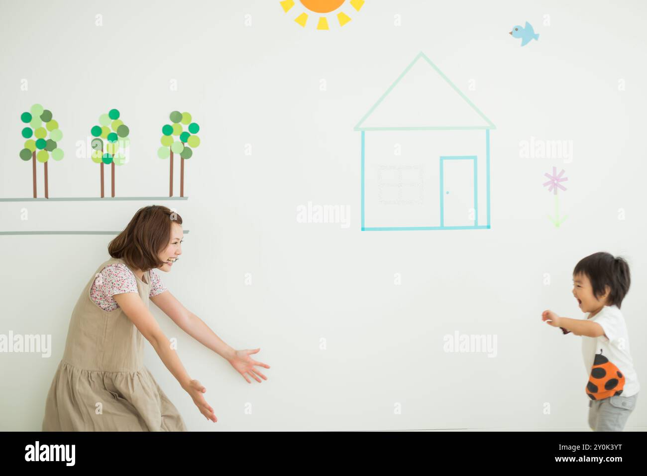 Mother calling her little boy Stock Photo - Alamy