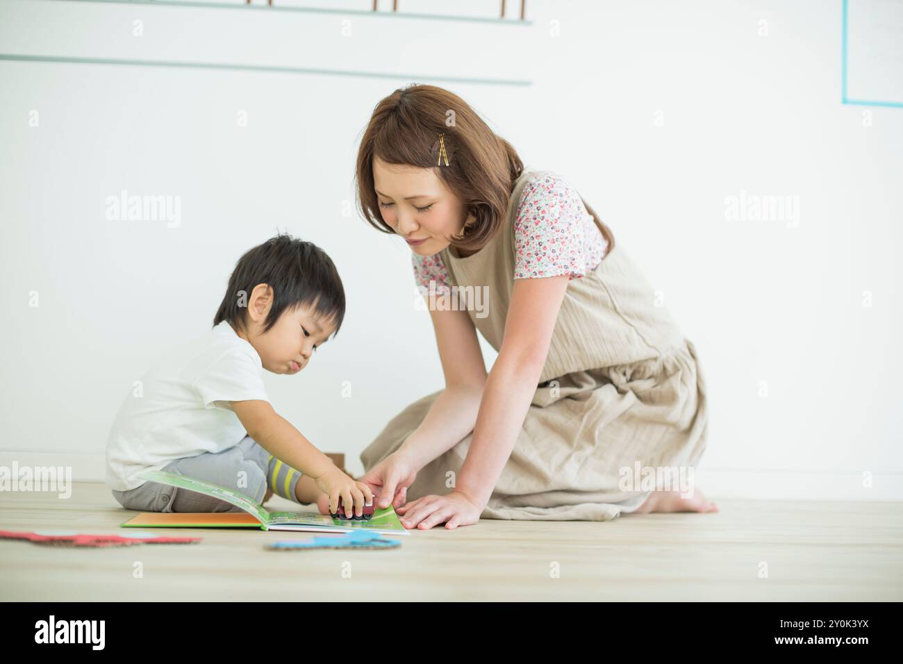 Parent and child playing Stock Photo - Alamy
