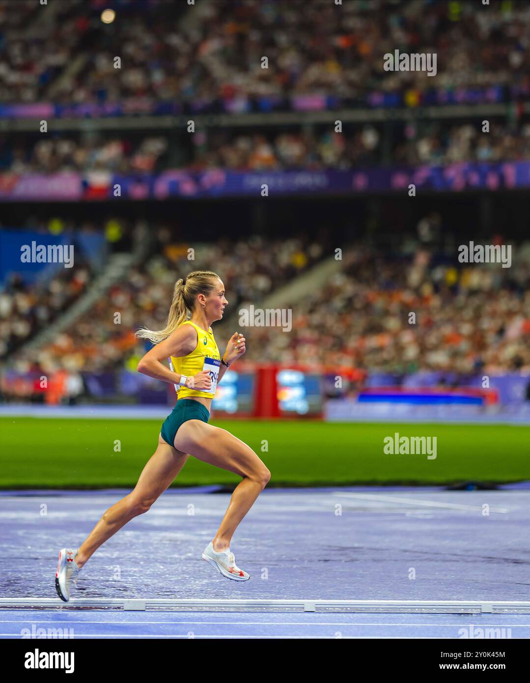 Lauren Ryan participating in the 5000 meters relay at the Paris 2024 ...