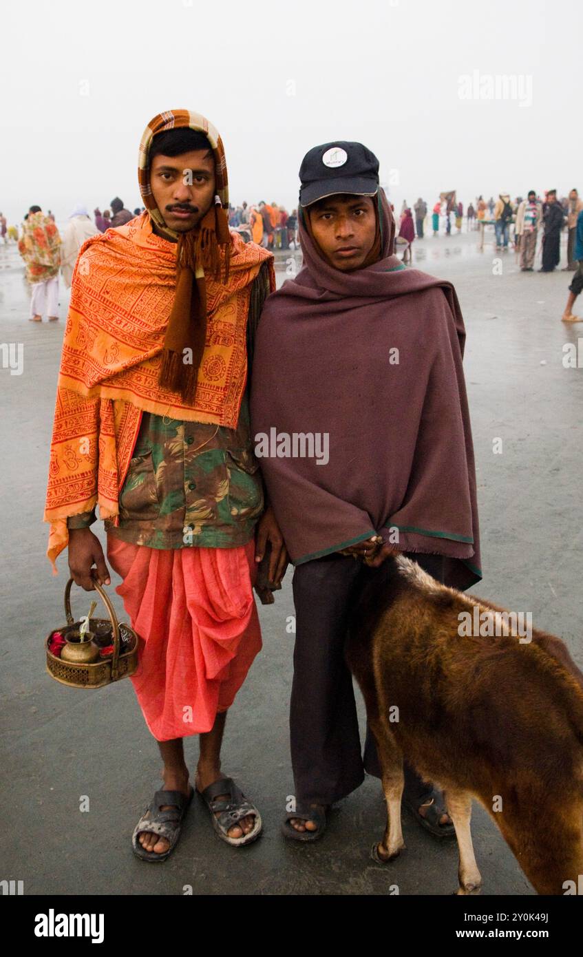 Hindu pilgrims by the Ganga river at Gangasagar, West Bengal, India ...