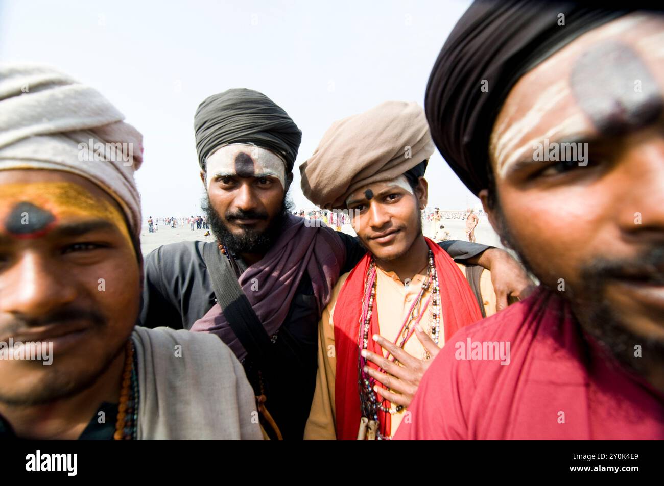 Hindu pilgrims by the Ganga river at Gangasagar, West Bengal, India ...