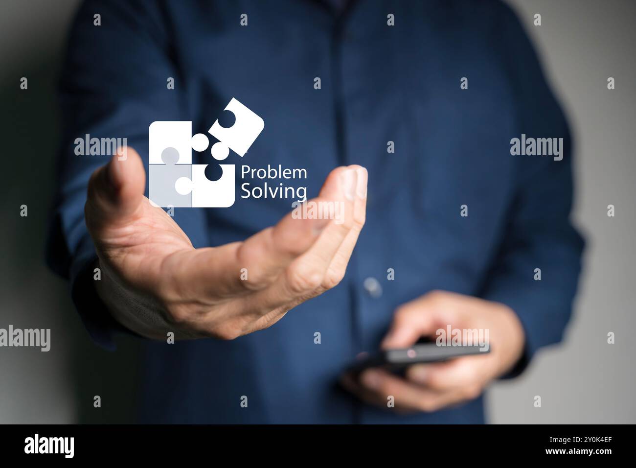 Problem solving strategy technique and solution concept, Person holding jigsaw icon with text ...