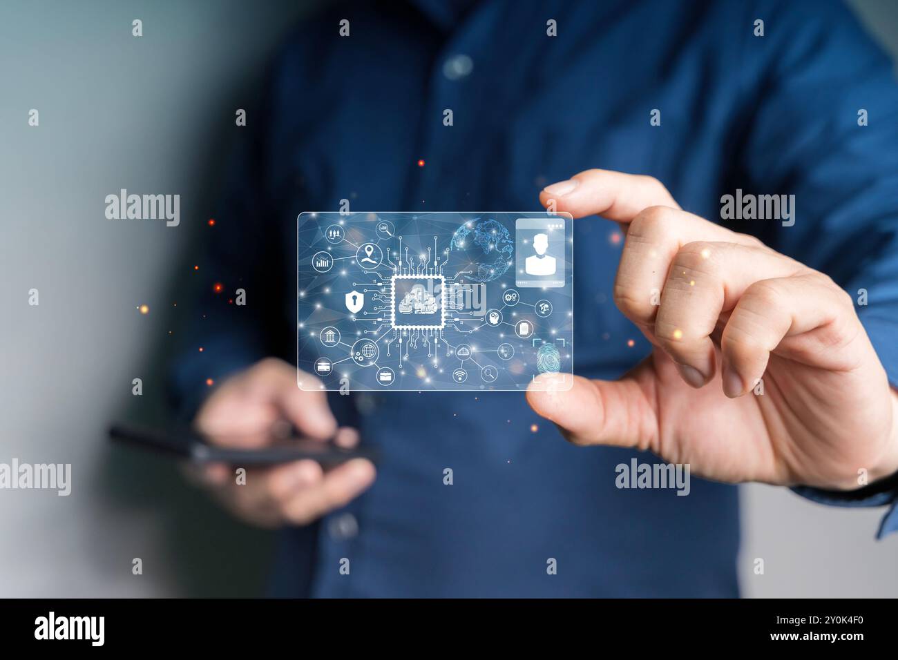 Hand of businessman holding digital identification card and technology ...